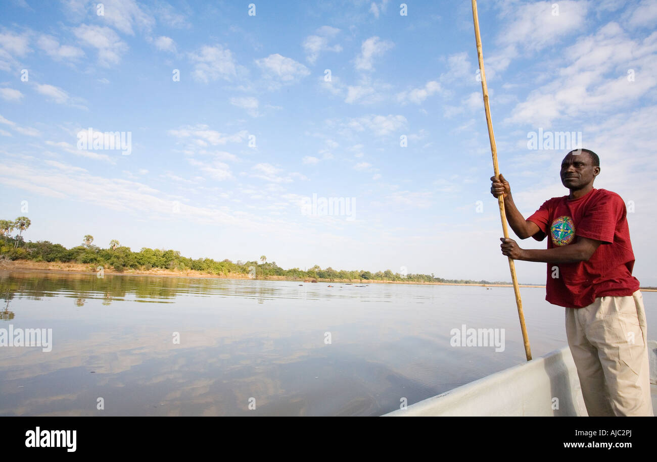 Man poling boat hi-res stock photography and images - Alamy