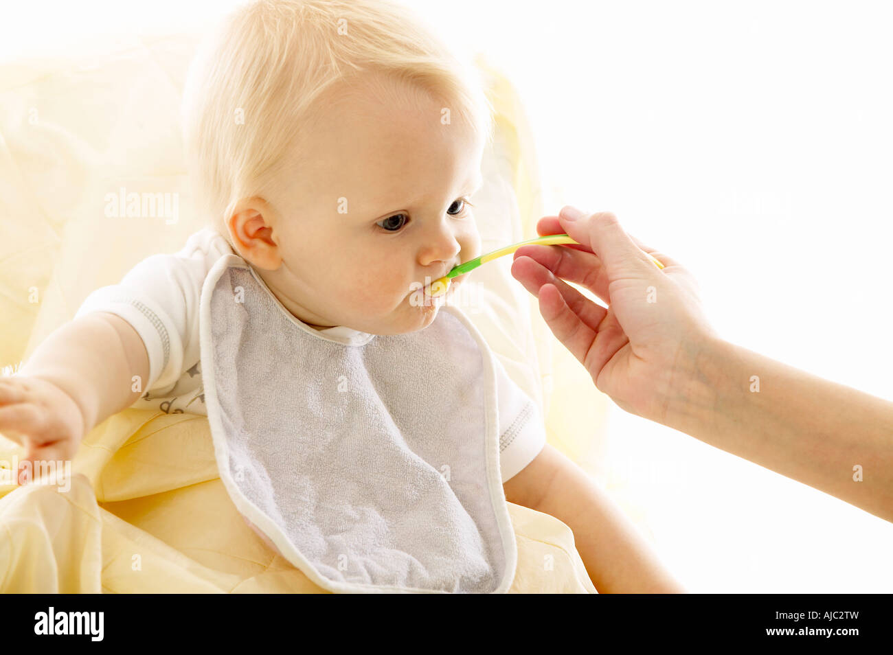 Baby Boy Feeding Stock Photo - Alamy