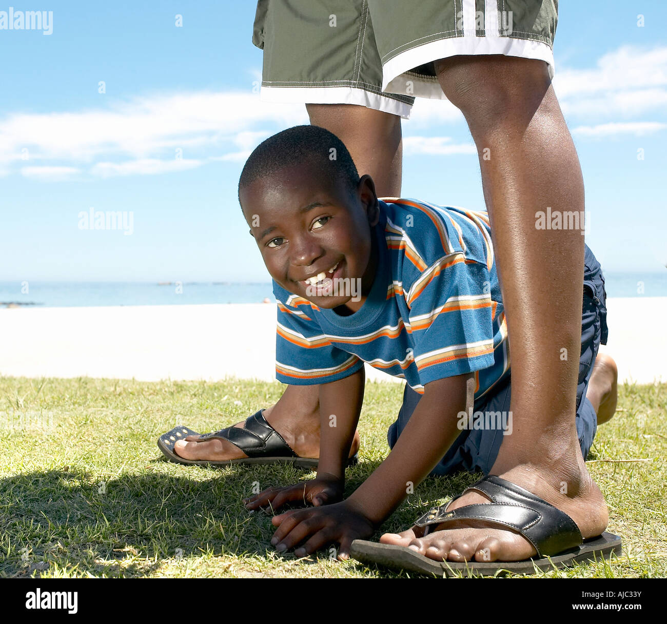 Boy crawling african hi-res stock photography and images - Alamy