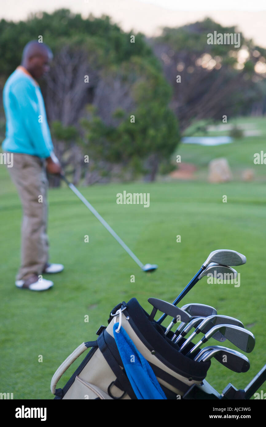 Man Addressing Golf Ball Stock Photo - Alamy