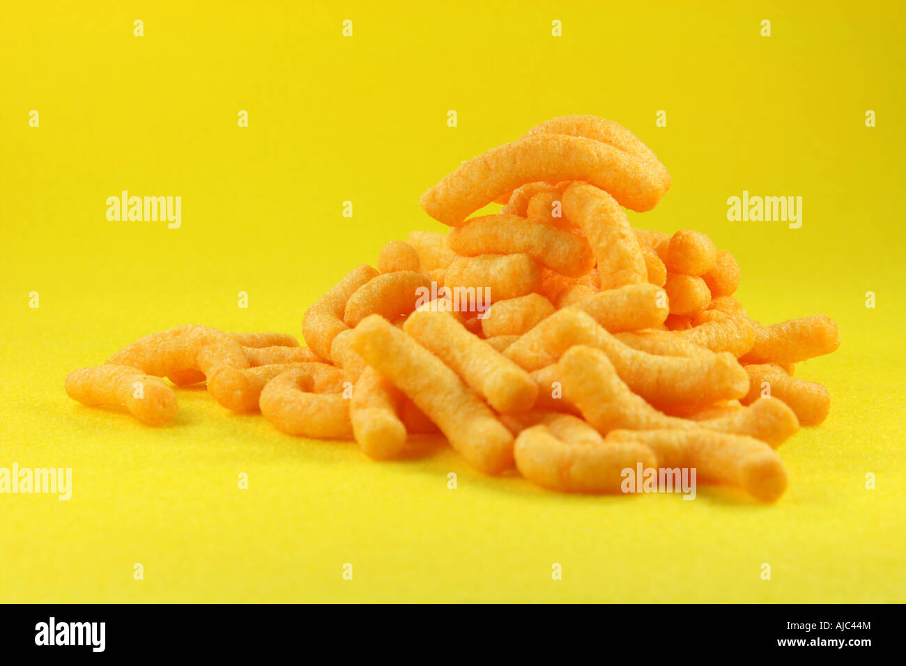 potato snacks with yellow background food concepts Stock Photo - Alamy
