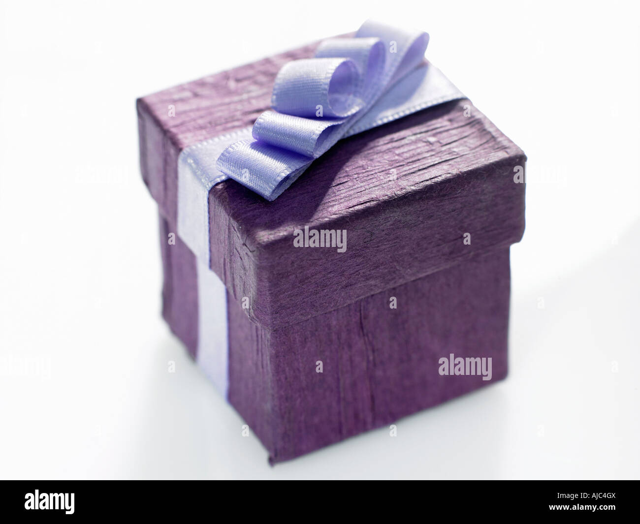 Purple Gift Box with Ribbon Stock Photo - Alamy