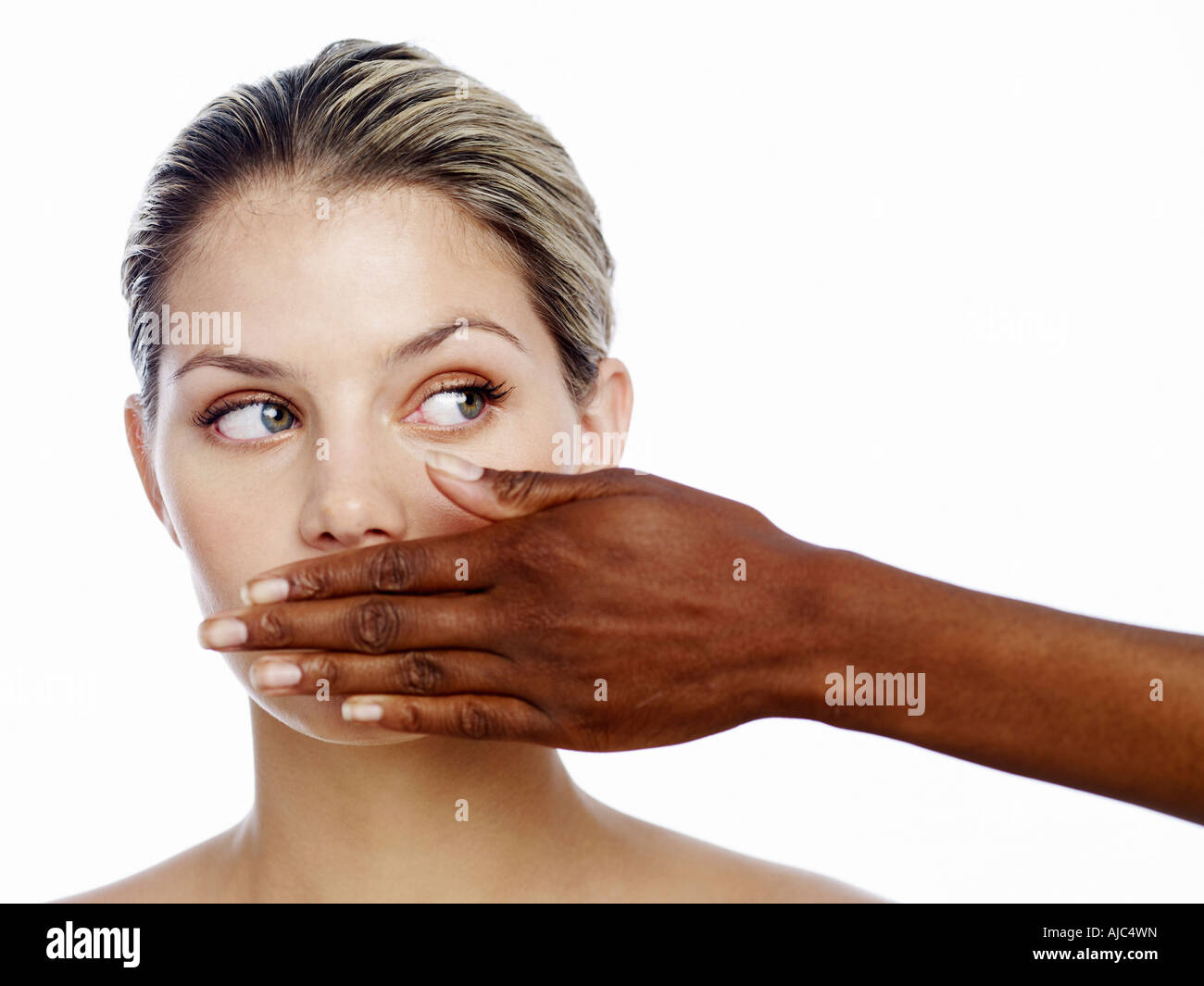 Hand covering womans mouth hi-res stock photography and images - Alamy