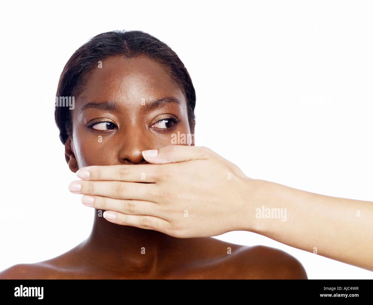 Woman's Hand in Front of Another Woman's Mouth Stock Photo - Alamy