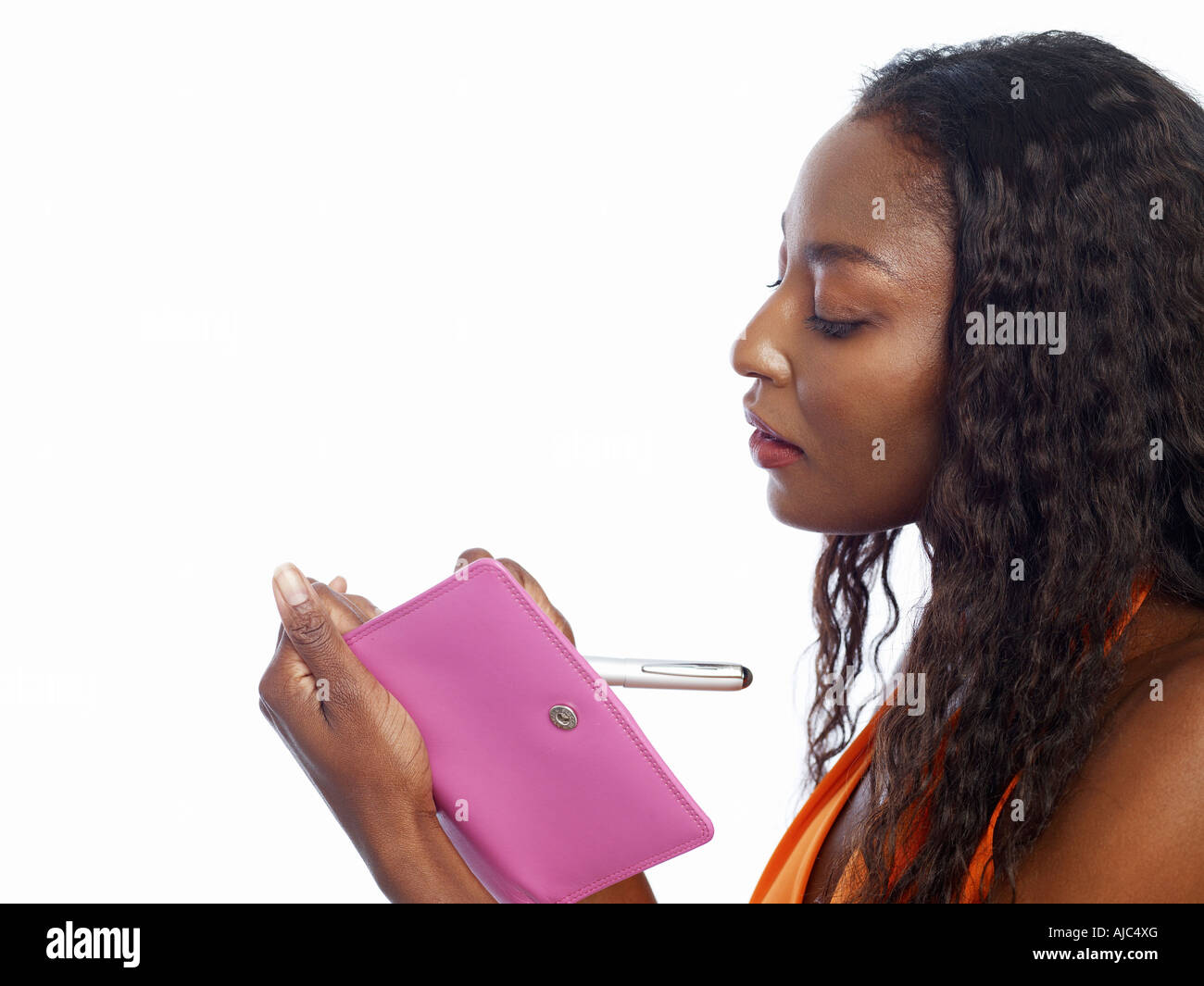 Woman Writing in her Diary Stock Photo - Alamy