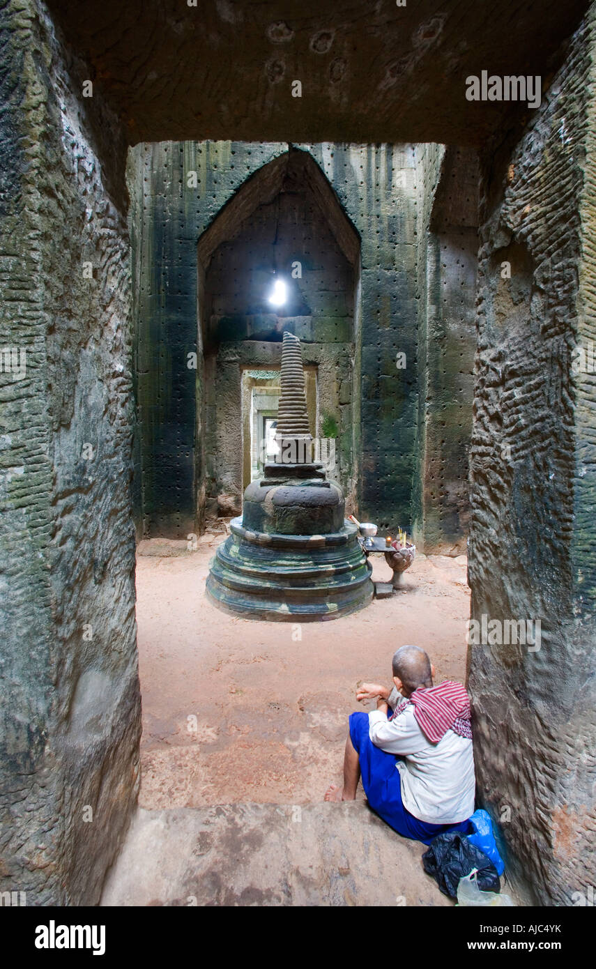Asian Man Sitting Inside a Temple Stock Photo - Alamy