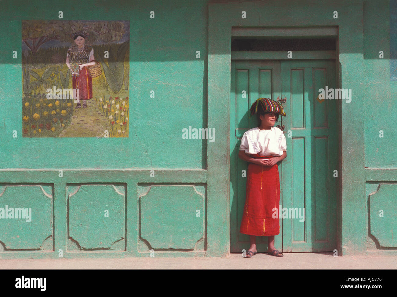 Ixil Maya woman standing in the doorway of her family home Nebaj El ...