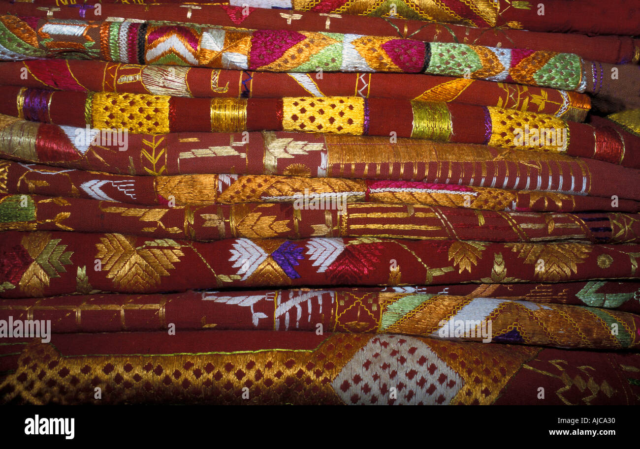 Stack of silk embroidered fabrics India Stock Photo - Alamy