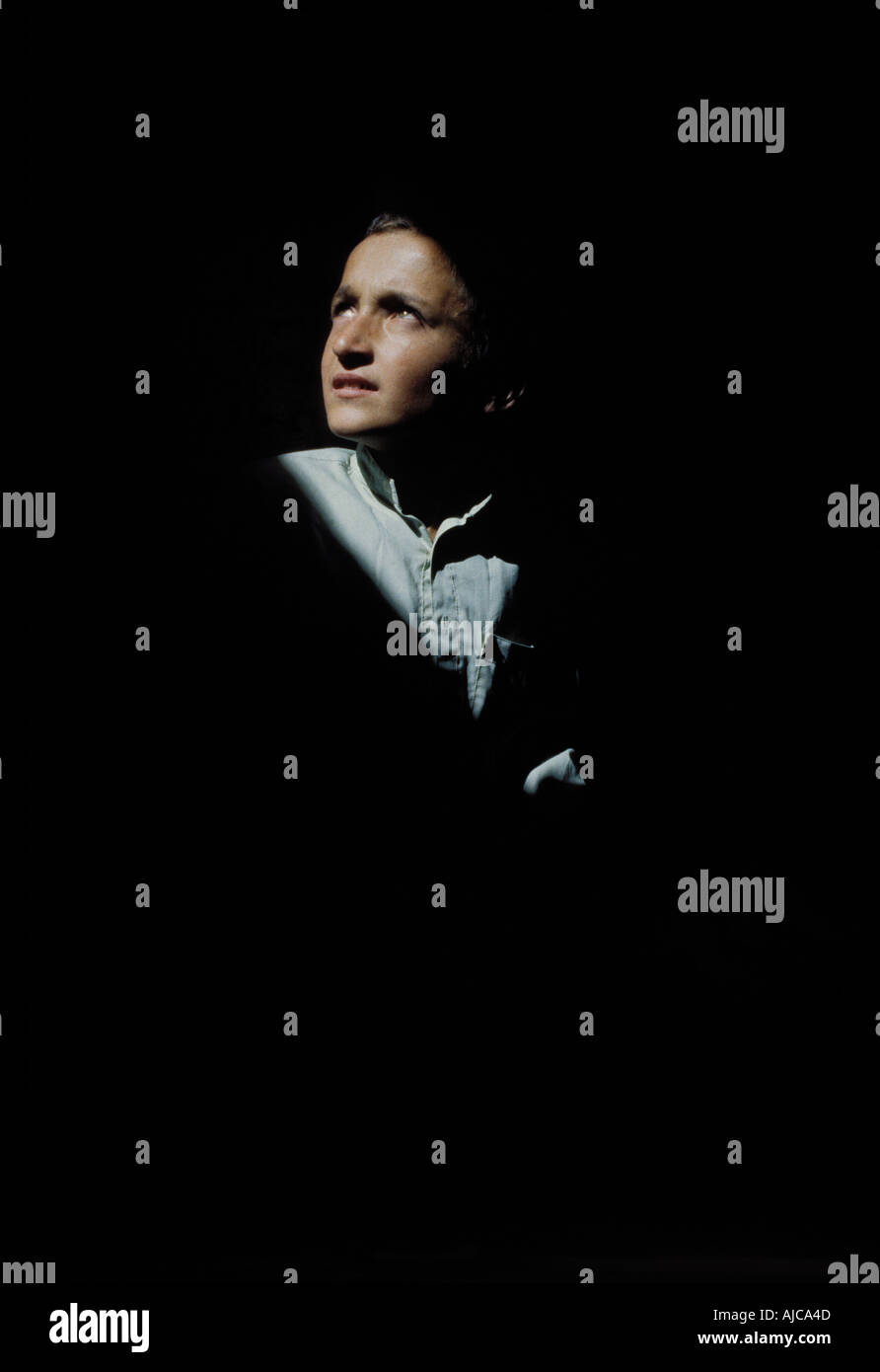 Pakistani boy from the Hunza valley photographed in a shaft of light at ...