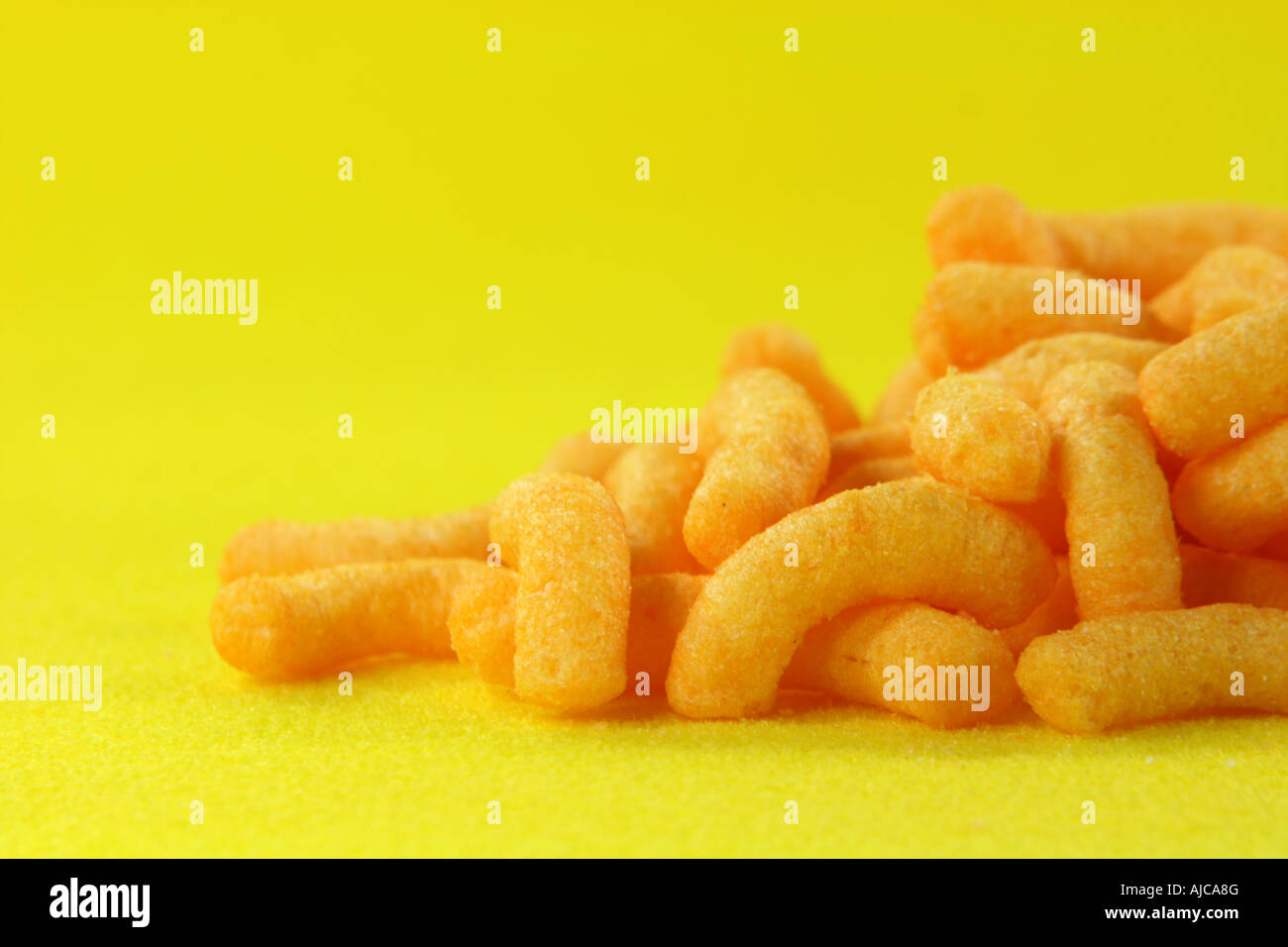 potato snacks with yellow background food concepts Stock Photo - Alamy