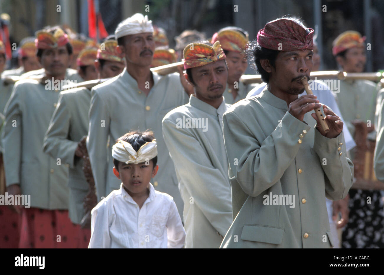 A group of Balinese men in a procession Full moon celebrations Ubud ...