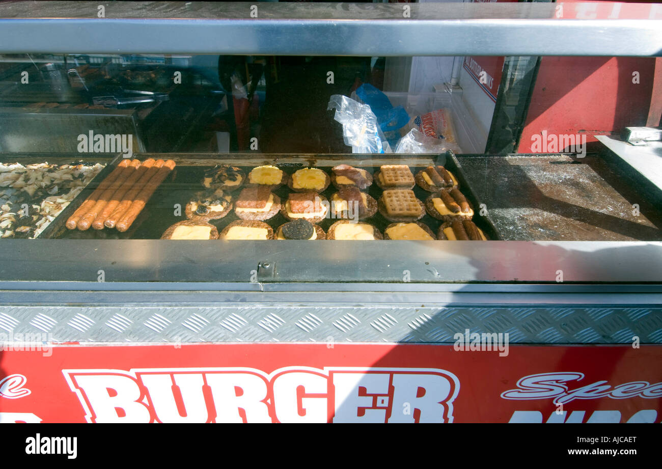 Burgers cooking in a Burger stall at the Seaside resort of Blackpool ...
