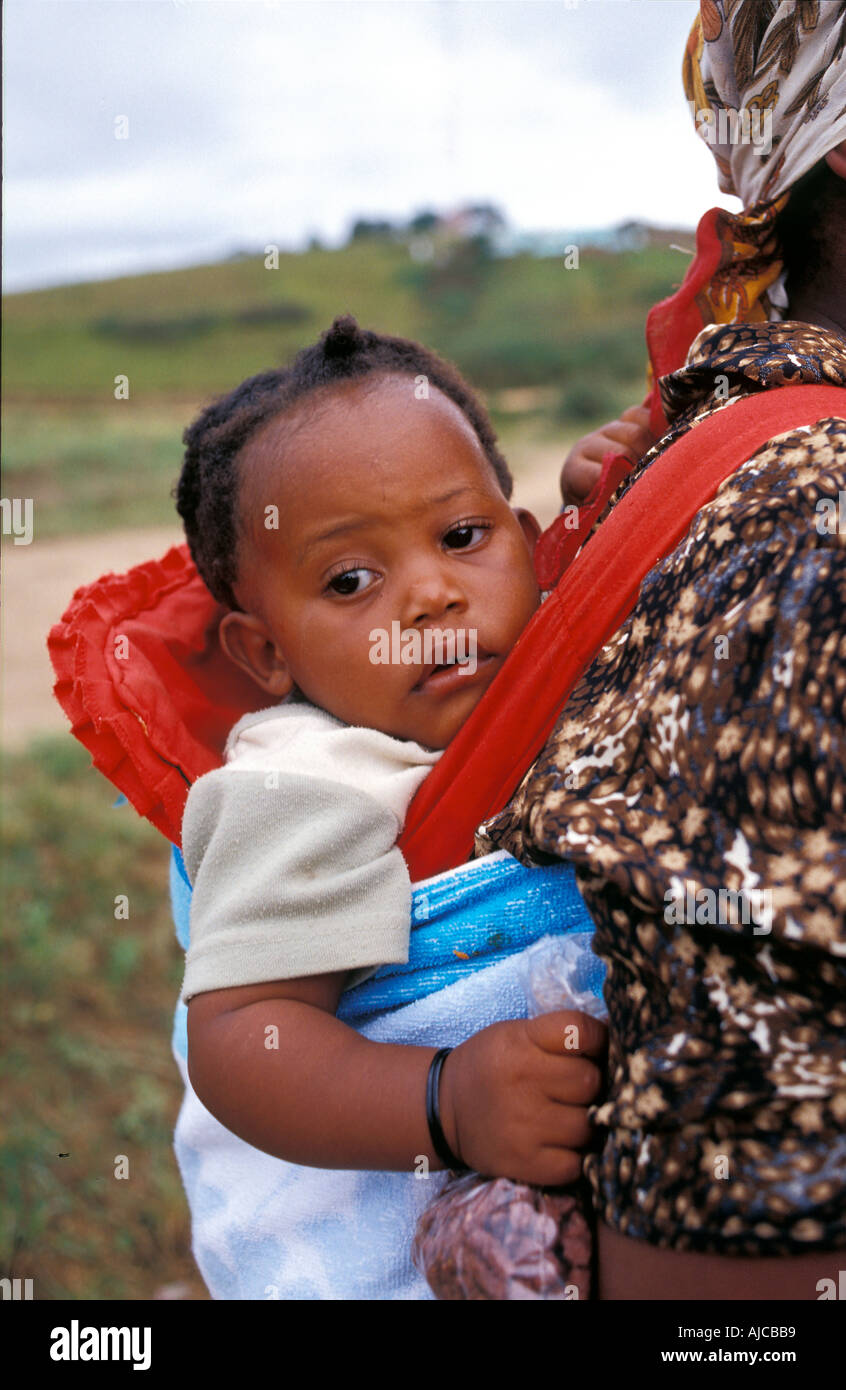 Zulu Woman from the the Durban area carrying a young child on her back ...
