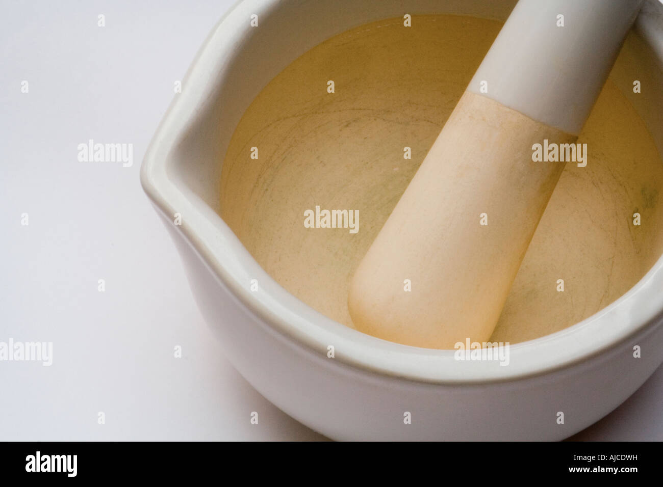 mortar and pestle bowl used for grinding in the ktichen or pharmacy or ...