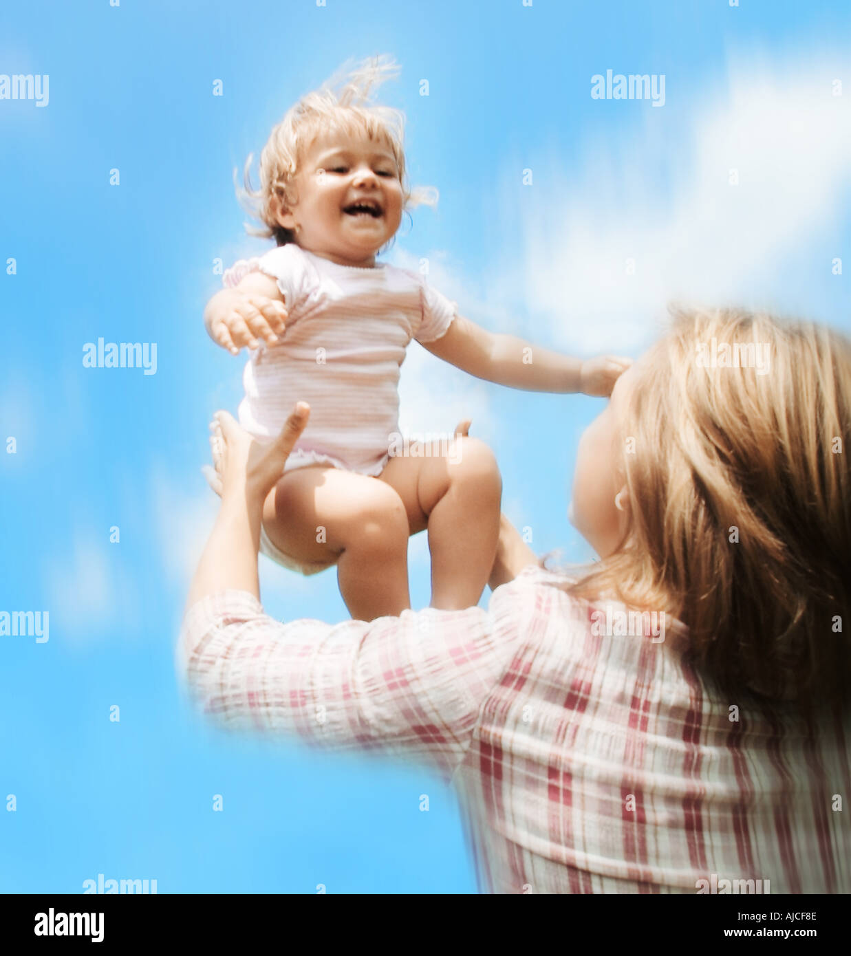Parents playing like children hi-res stock photography and images - Alamy