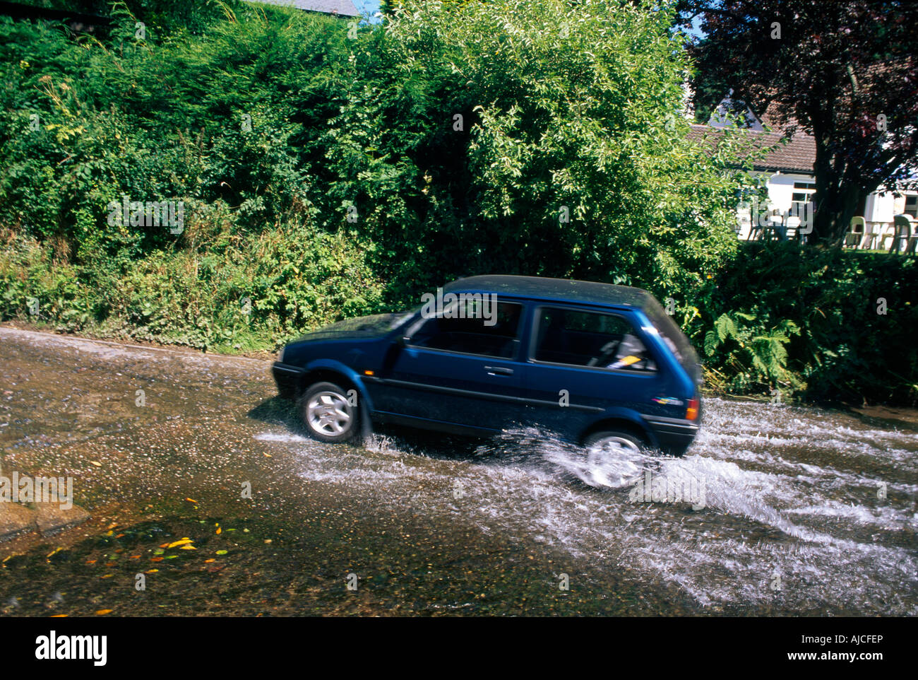 Car crossing ford hi-res stock photography and images - Alamy