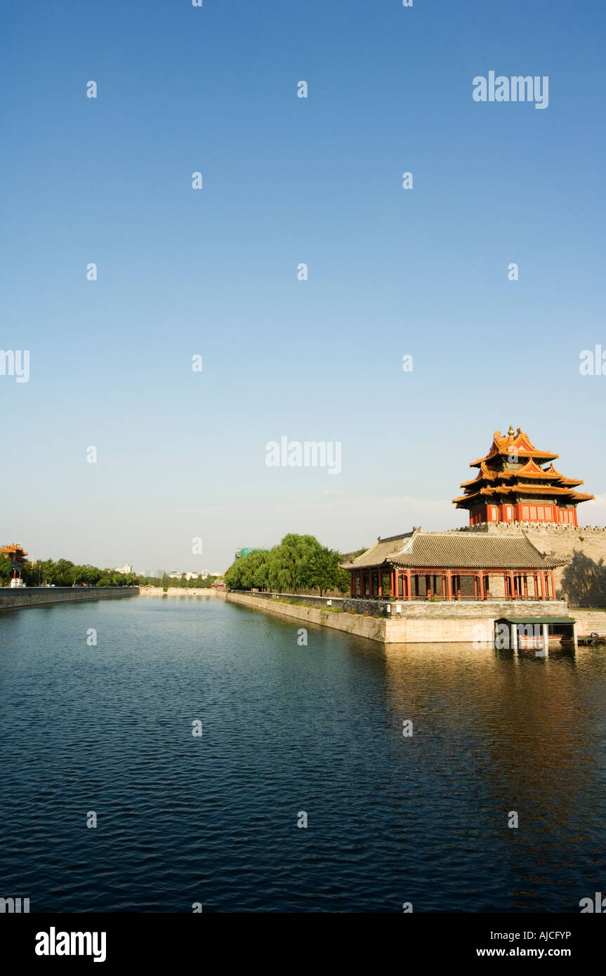 A Palace Wall Tower surrounded by the moat of The Forbidden City Palace ...