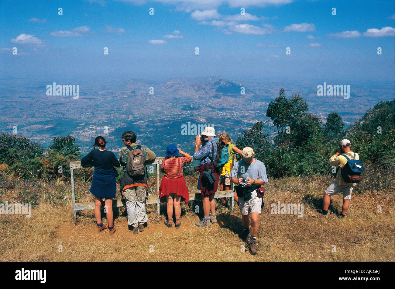 A group of white tourists enjoying the spectacular view from the Zomba ...