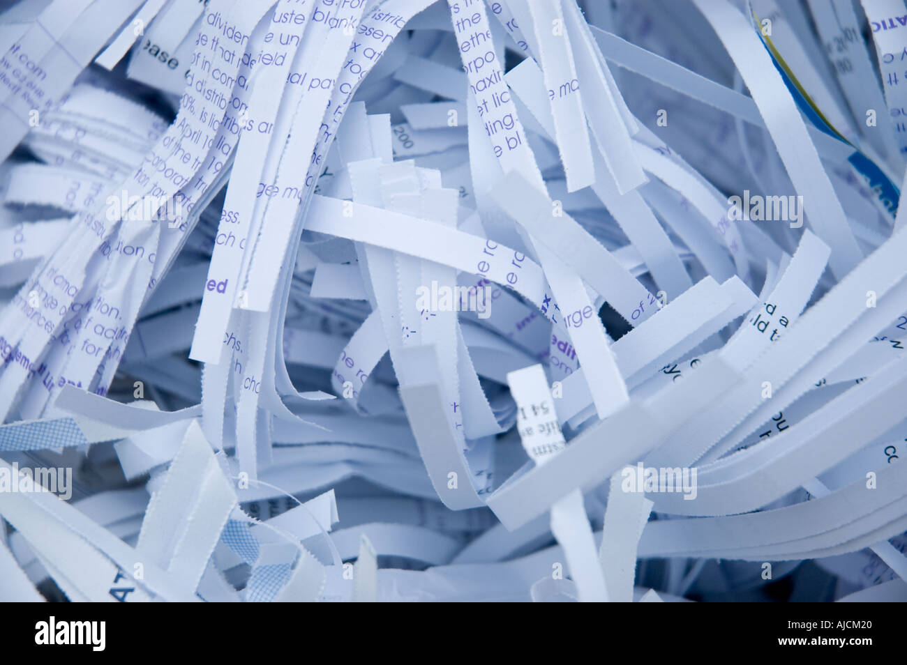 Shredded paper from a straight cut shredder ready for recycling Stock ...
