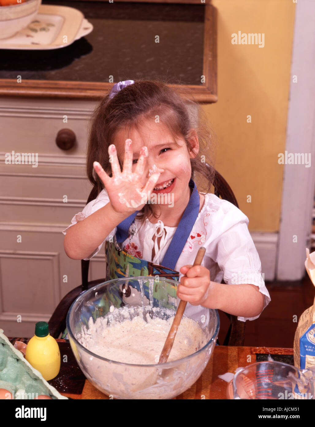 Child covered in flour hi-res stock photography and images - Alamy