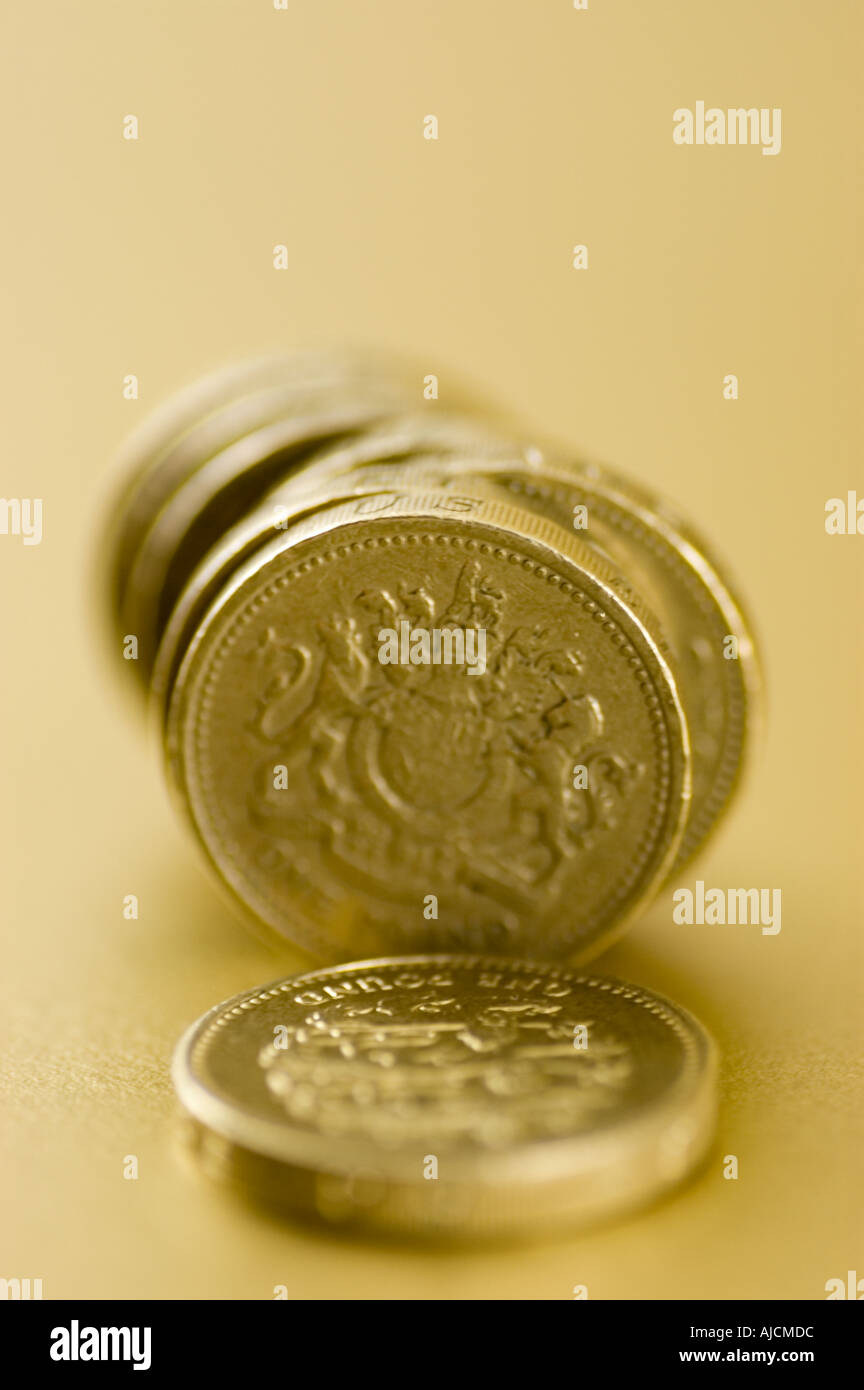 Close up macro view of a stack of British One Pound coins against a ...