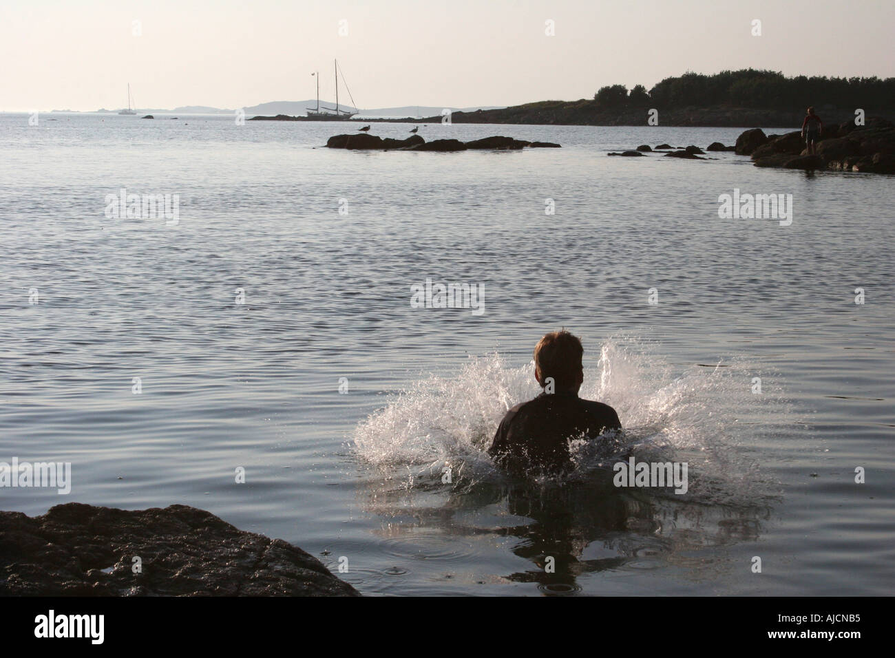 jumping at sunset Stock Photo - Alamy