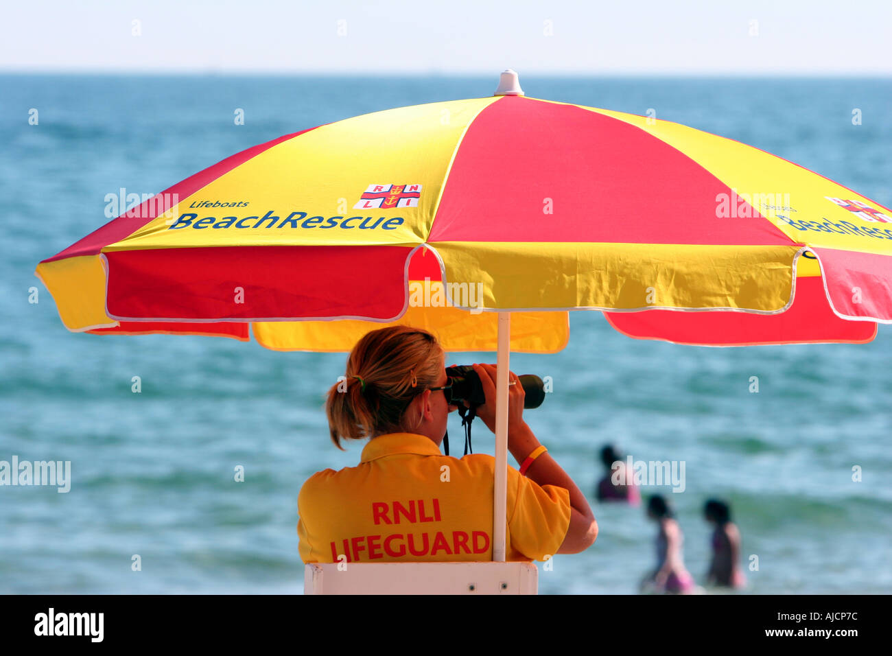 Rnli lifeguard binoculars yellow red hi-res stock photography and ...