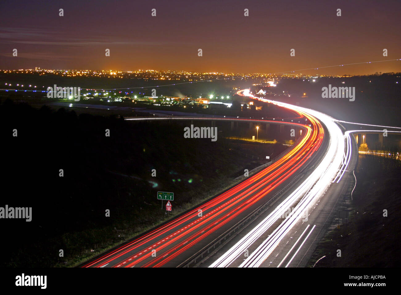 A long exposure photograph looking down from the flyover bridge that ...