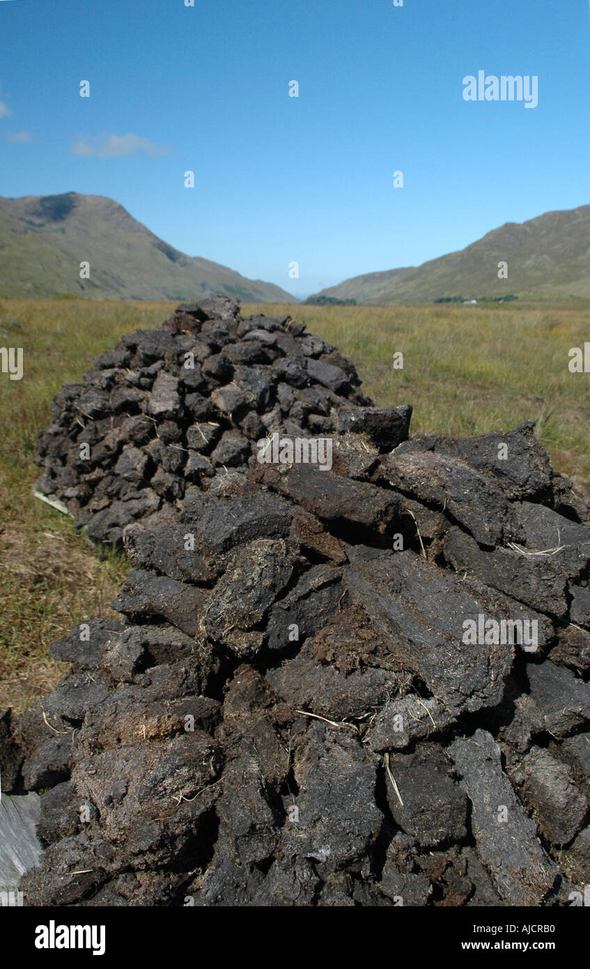 Peat drying on racks in a bog in Connemara Galway Ireland Stock Photo ...