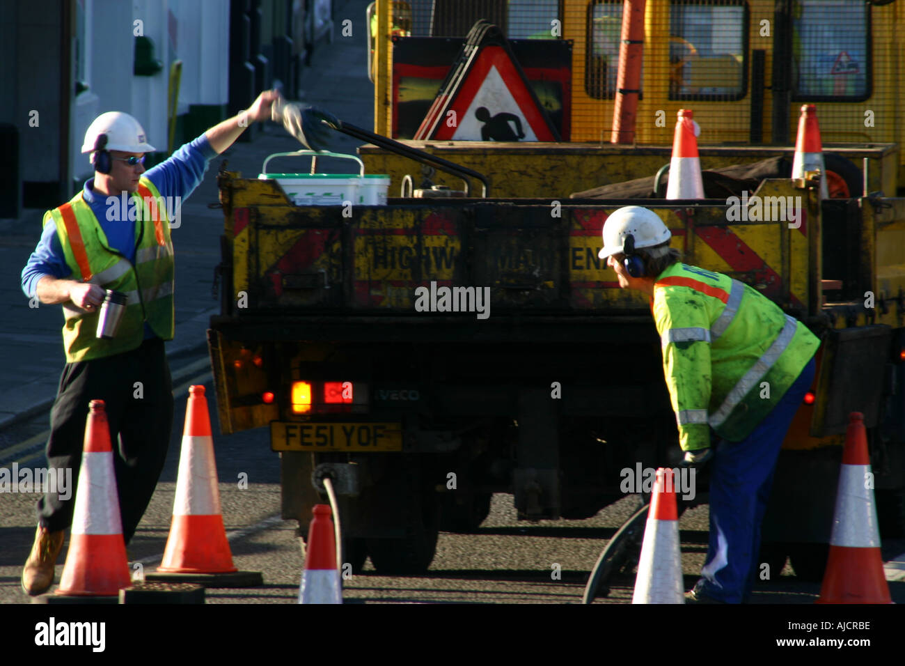 men at work Stock Photo - Alamy