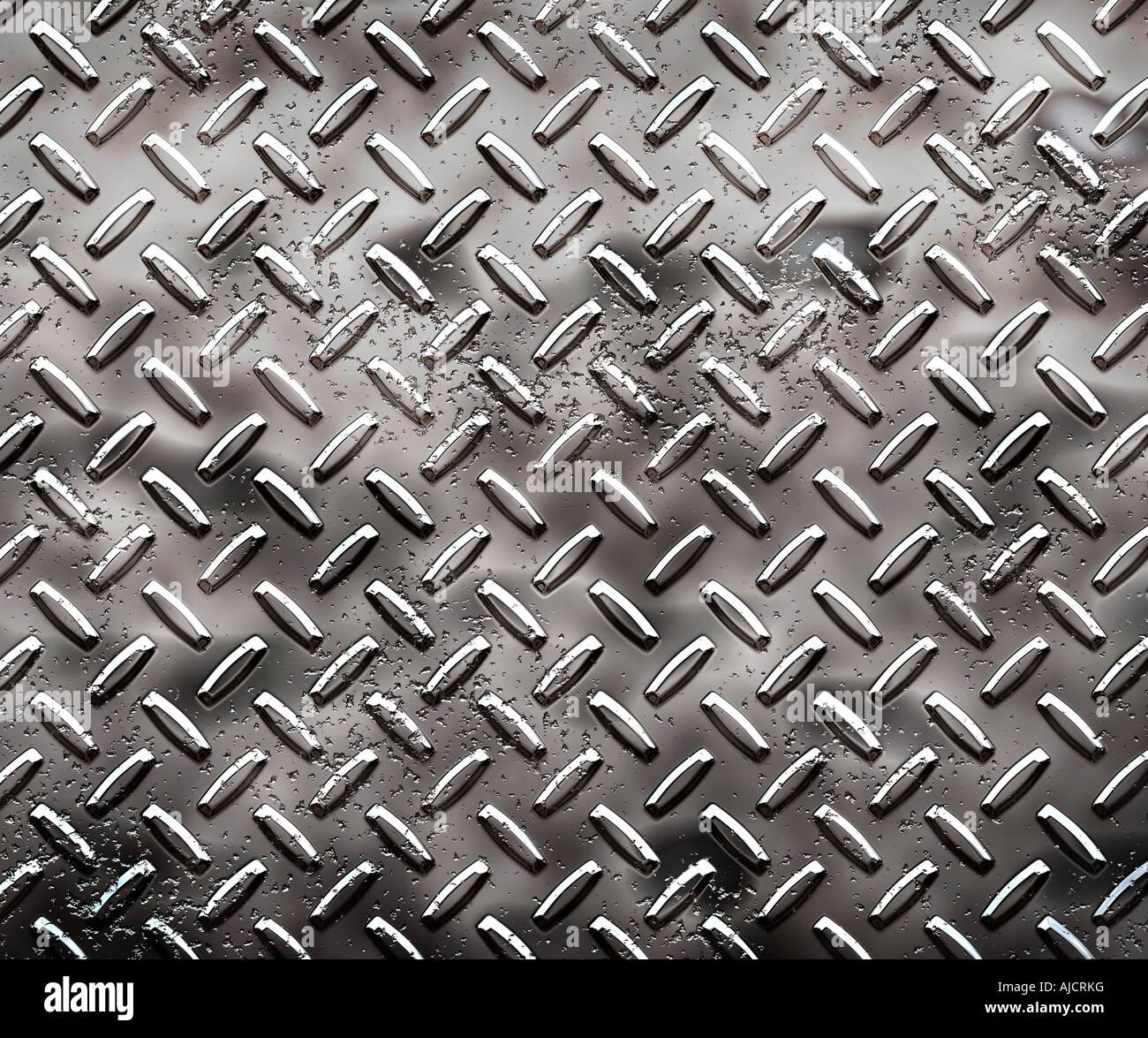 a very large sheet of rough black diamond plate with pits and marks ...