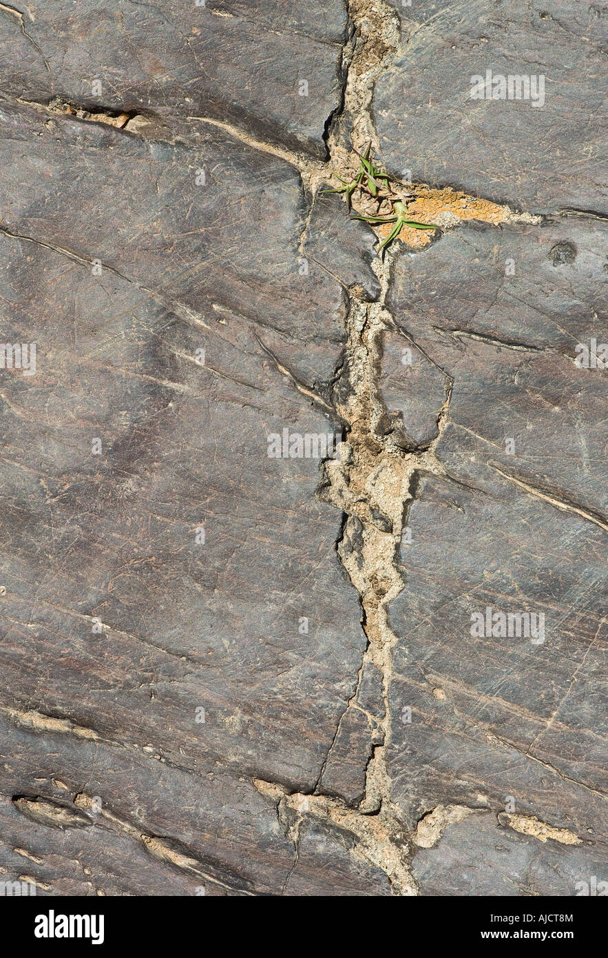 old worn and weathered granite rock background Stock Photo - Alamy