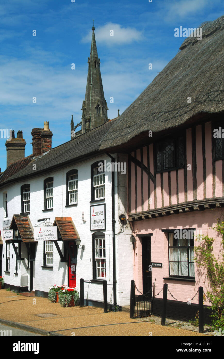 Historical Woolpit village pink half timbered thatched roof cottages ...