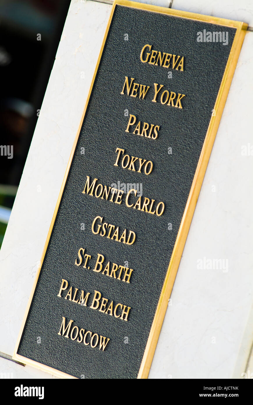 International cities listed on brass plaque Stock Photo - Alamy
