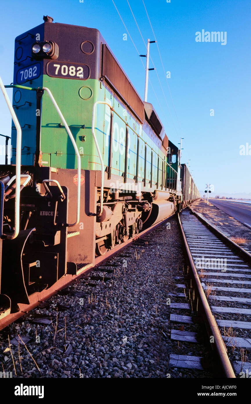Freight train engine and cars Stock Photo - Alamy