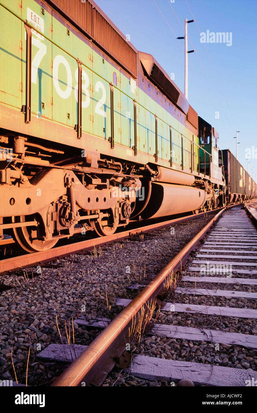 Freight train engine and cars Stock Photo - Alamy