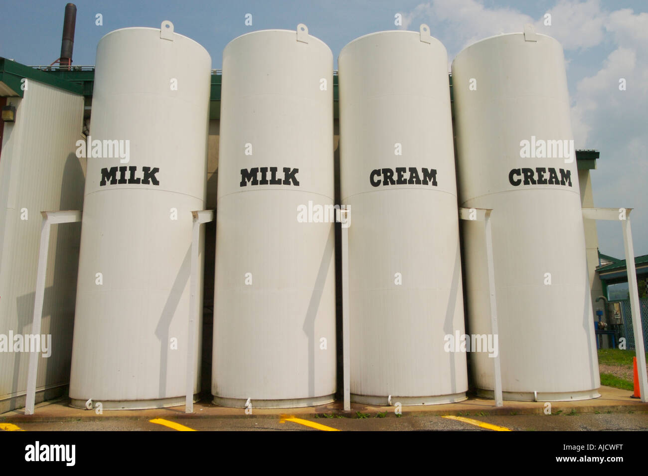 Milk and cream storage tanks at an ice cream factory Ben and Jerry's ...