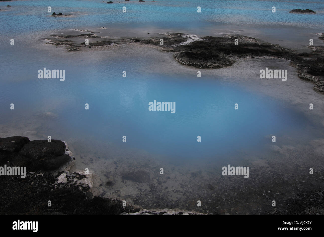 Pools of blue sulphur laden water at the Blue Lagoon resort south west ...