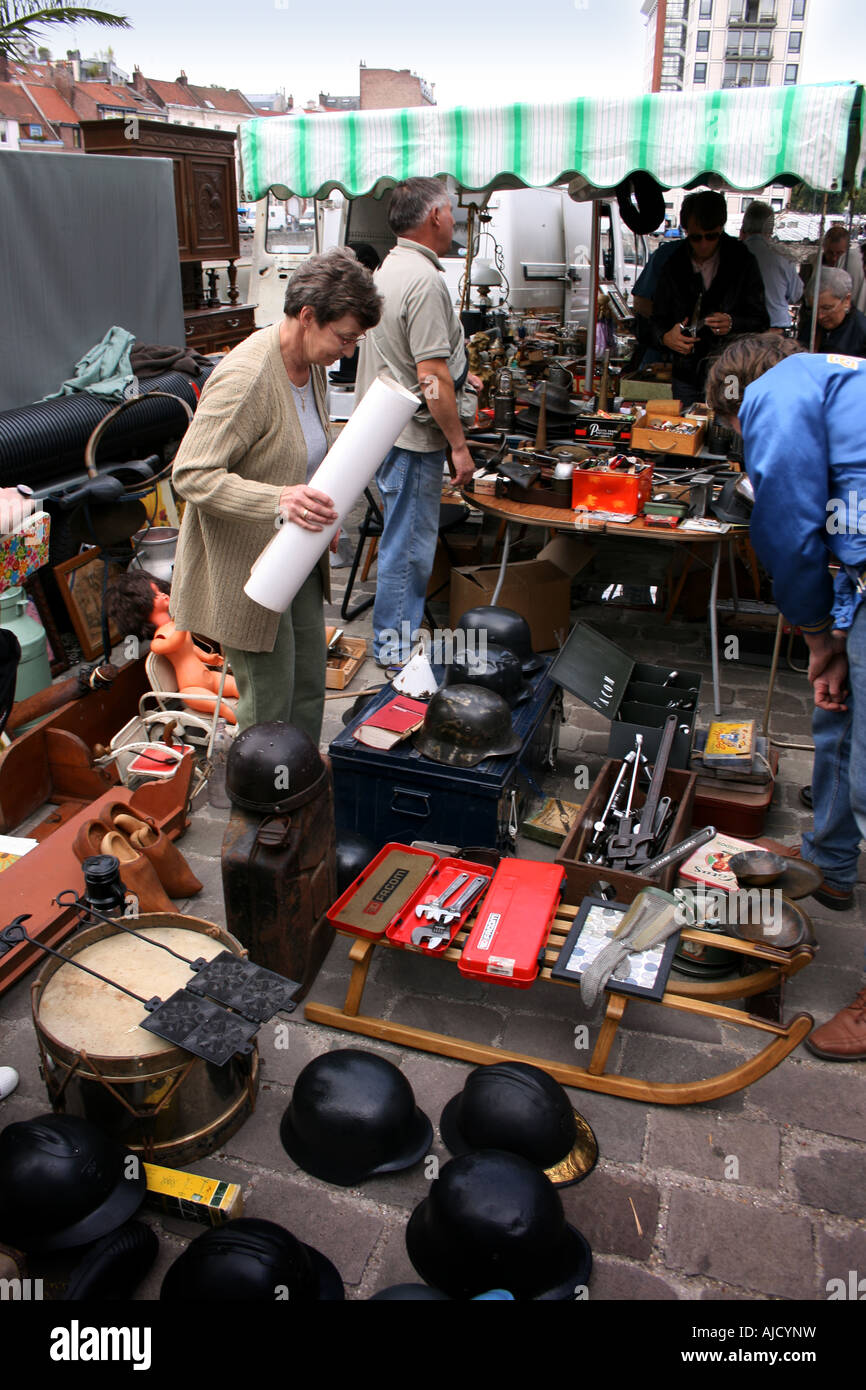 People looking through items on military antiques stall at the Braderie ...