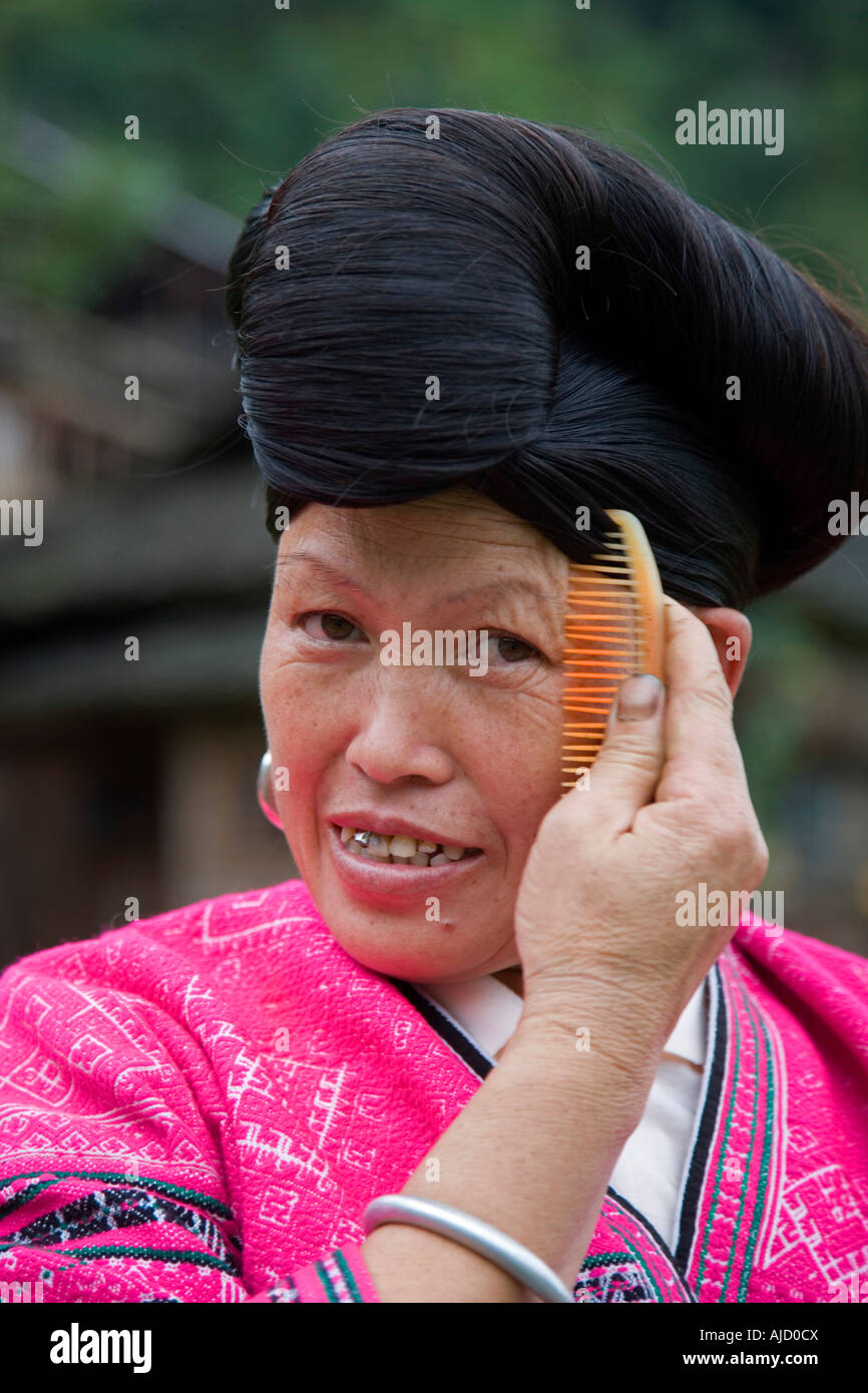 Yao woman combing her long hair hi-res stock photography and images - Alamy