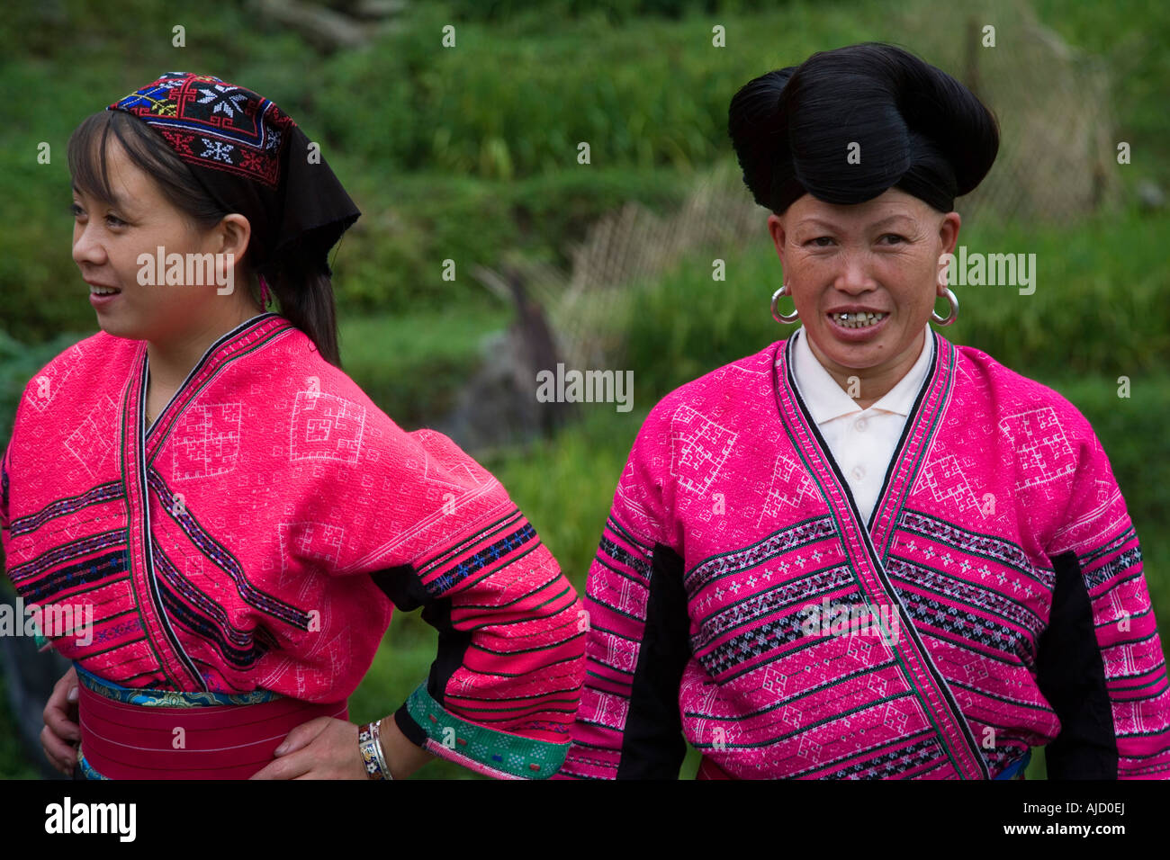 2 Red Yao women in traditional dress in their village near Guilin China ...