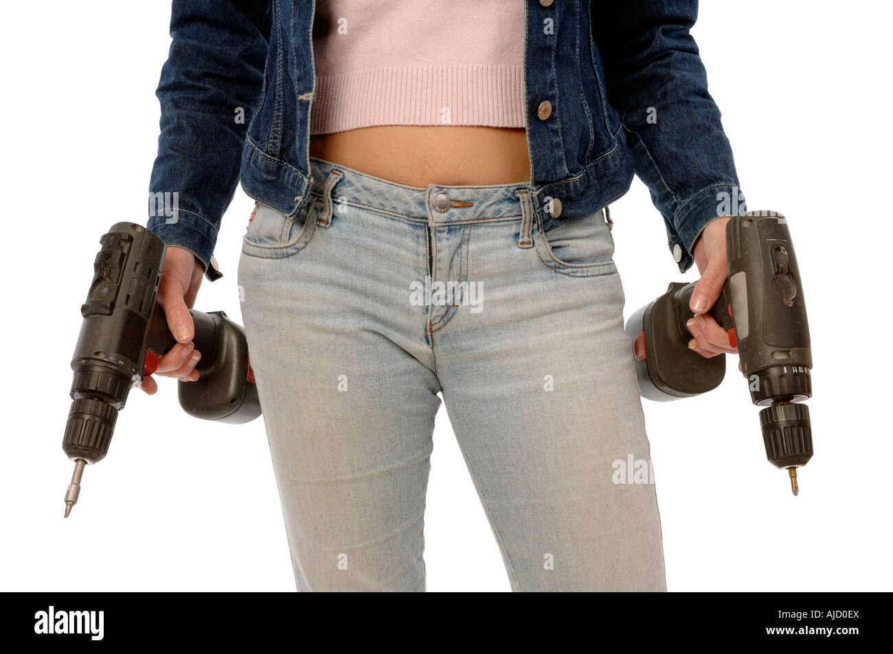 Woman holding power tools Stock Photo - Alamy