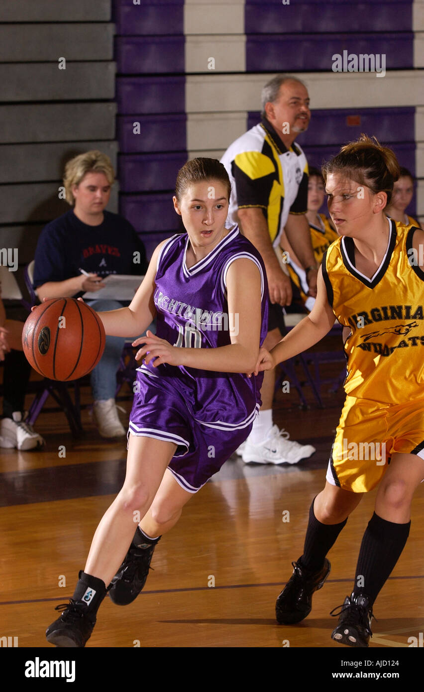 Action from youth girls basketball game Stock Photo - Alamy