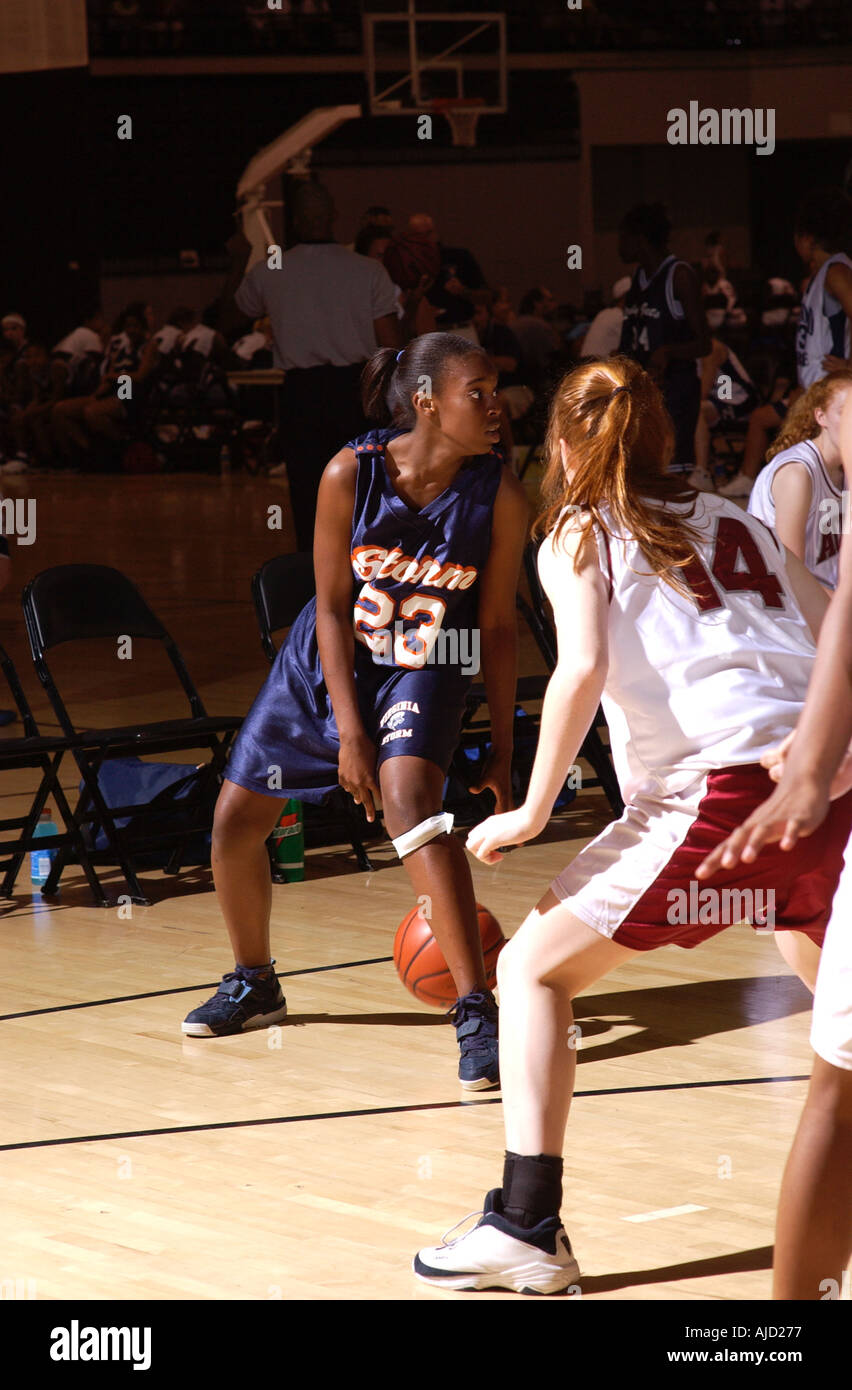 Action from youth girls basketball game Stock Photo - Alamy