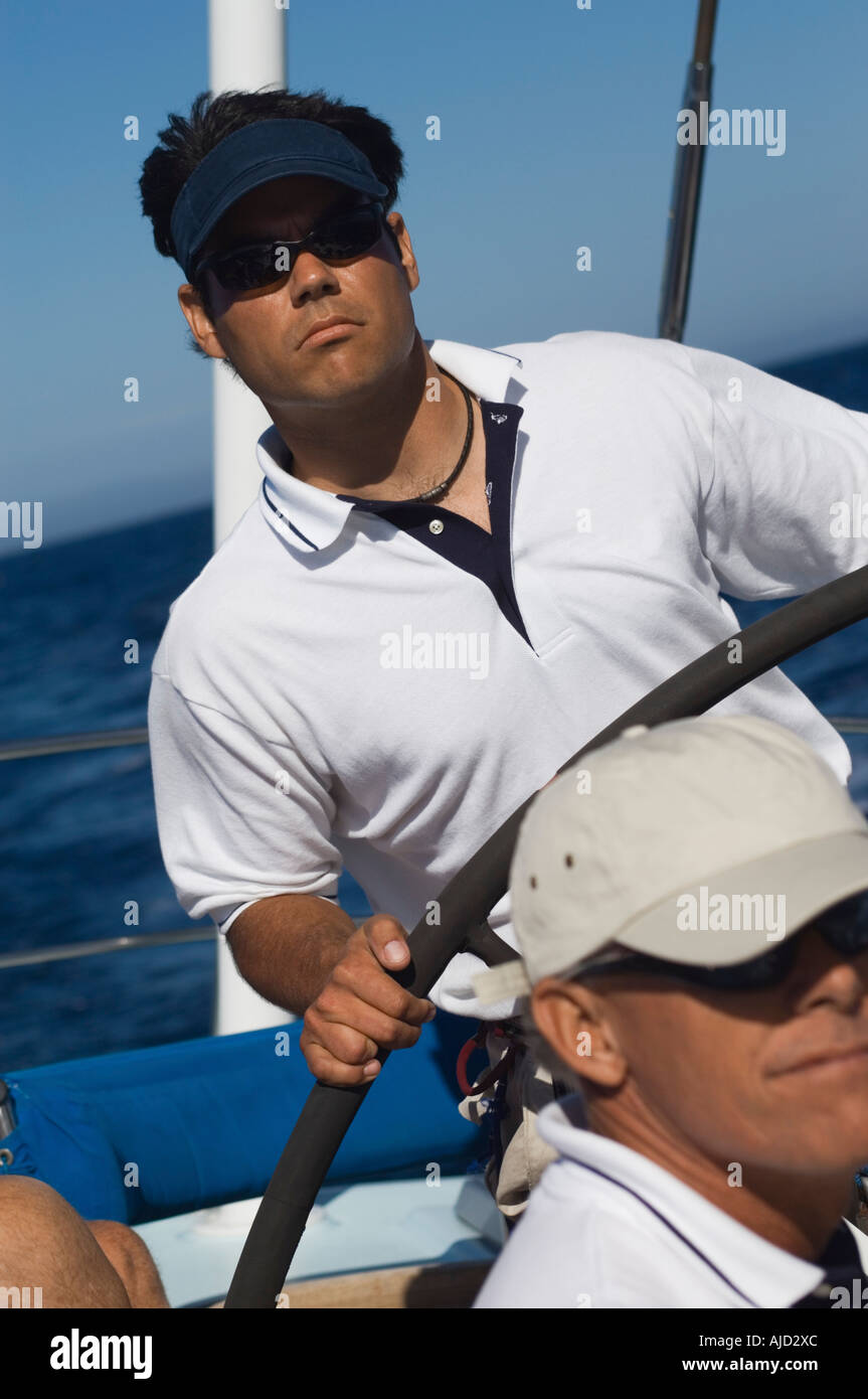 Man at helm hi-res stock photography and images - Alamy