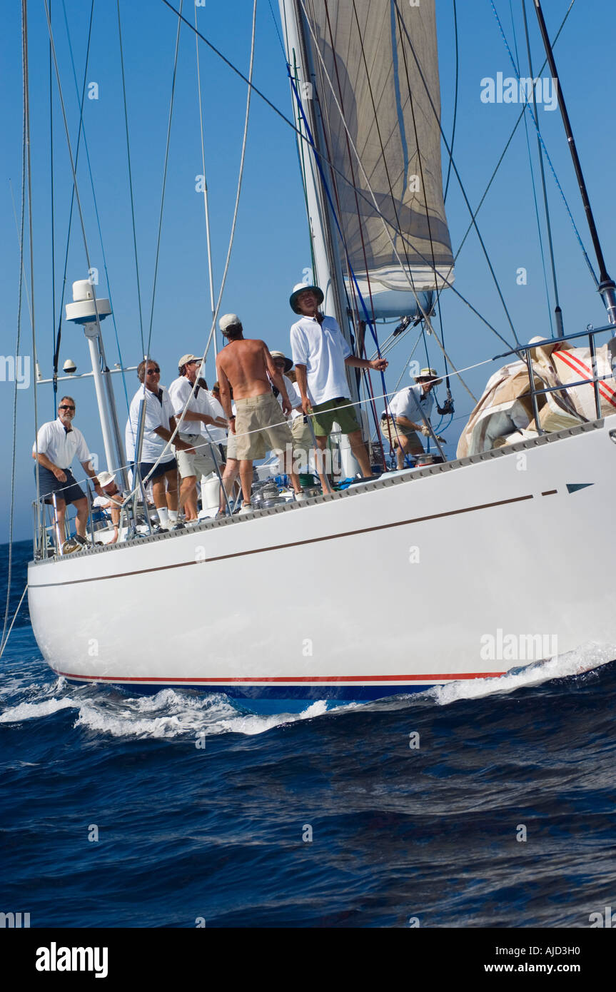 Crew on sailboat on ocean Stock Photo - Alamy