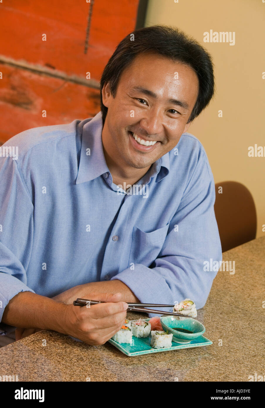 Man Eating Sushi, portrait Stock Photo - Alamy