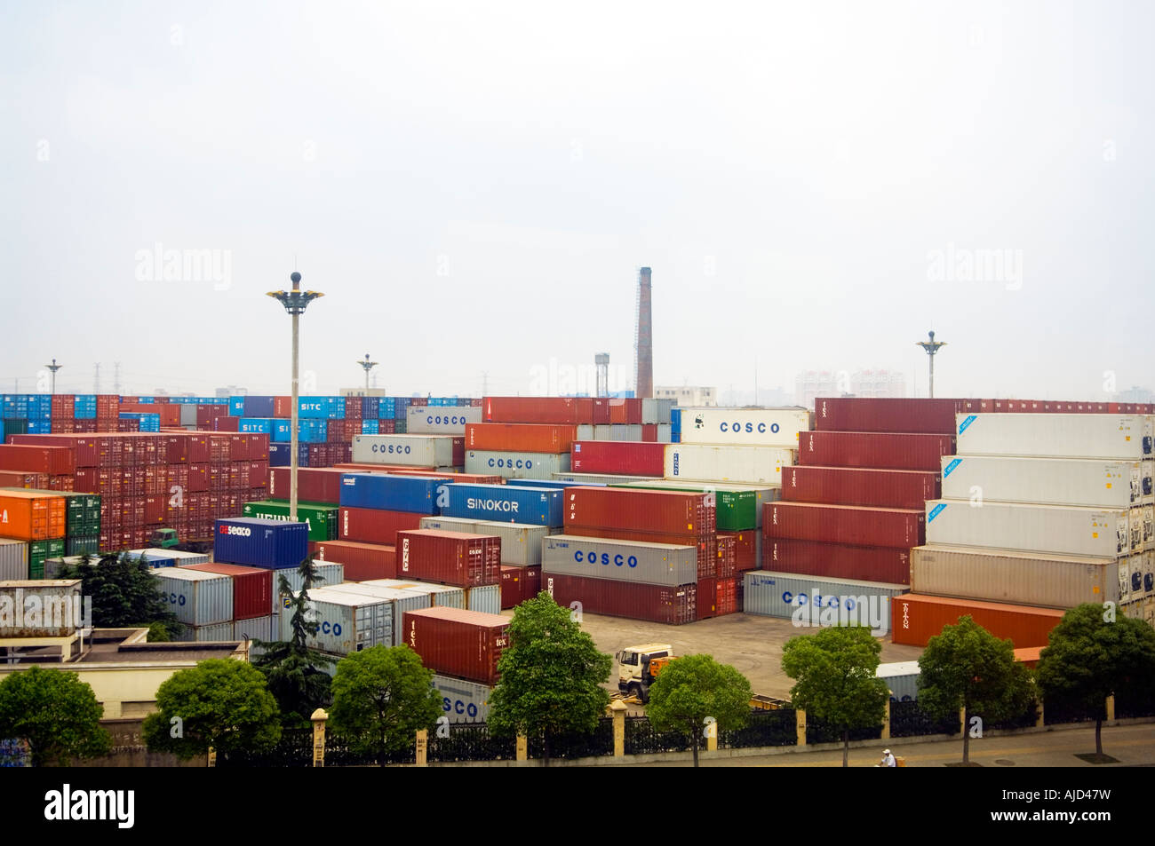 Cargo containers at Shanghai harbour Stock Photo - Alamy