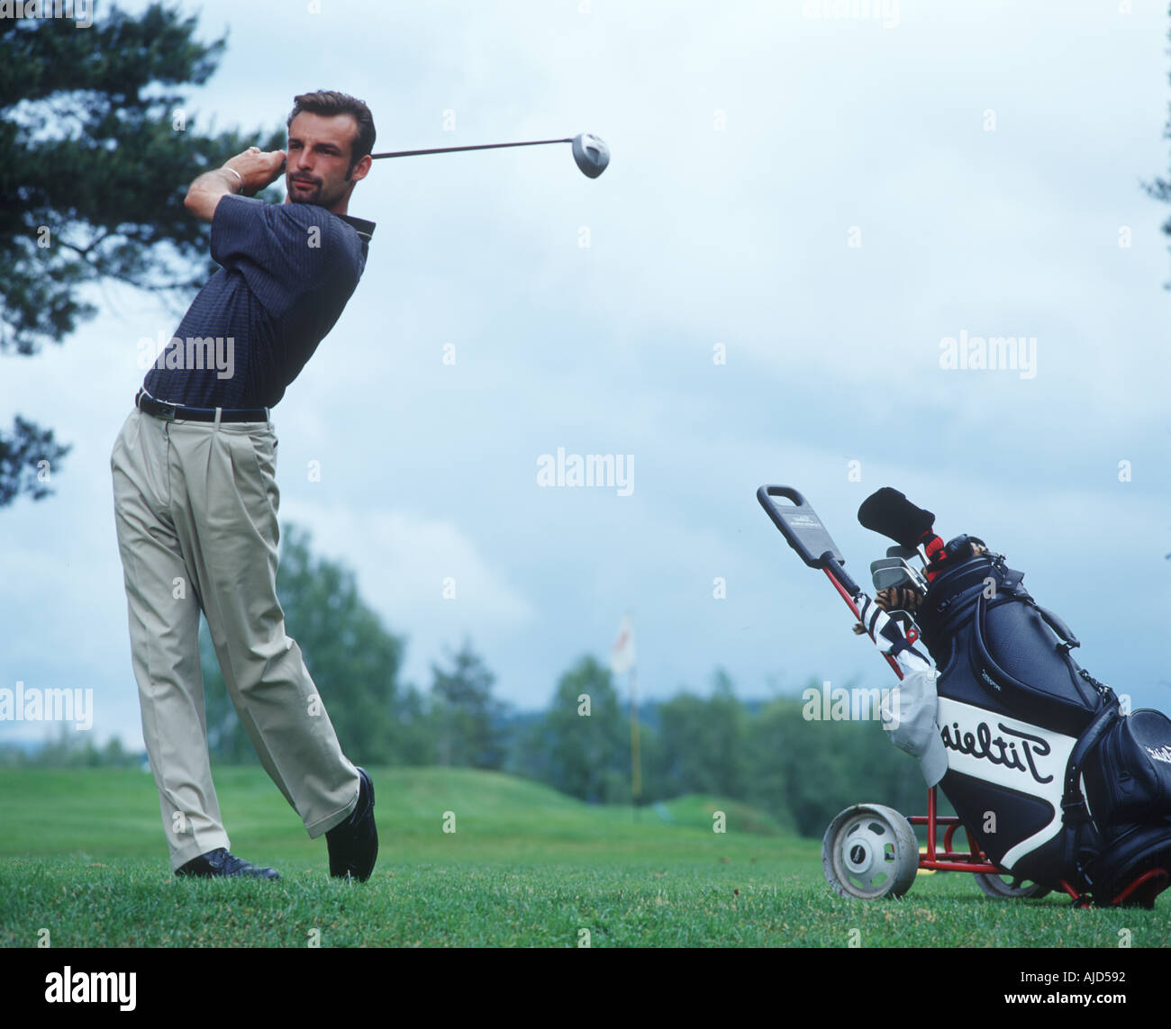 Guys Playing Golf High Resolution Stock Photography and Images - Alamy