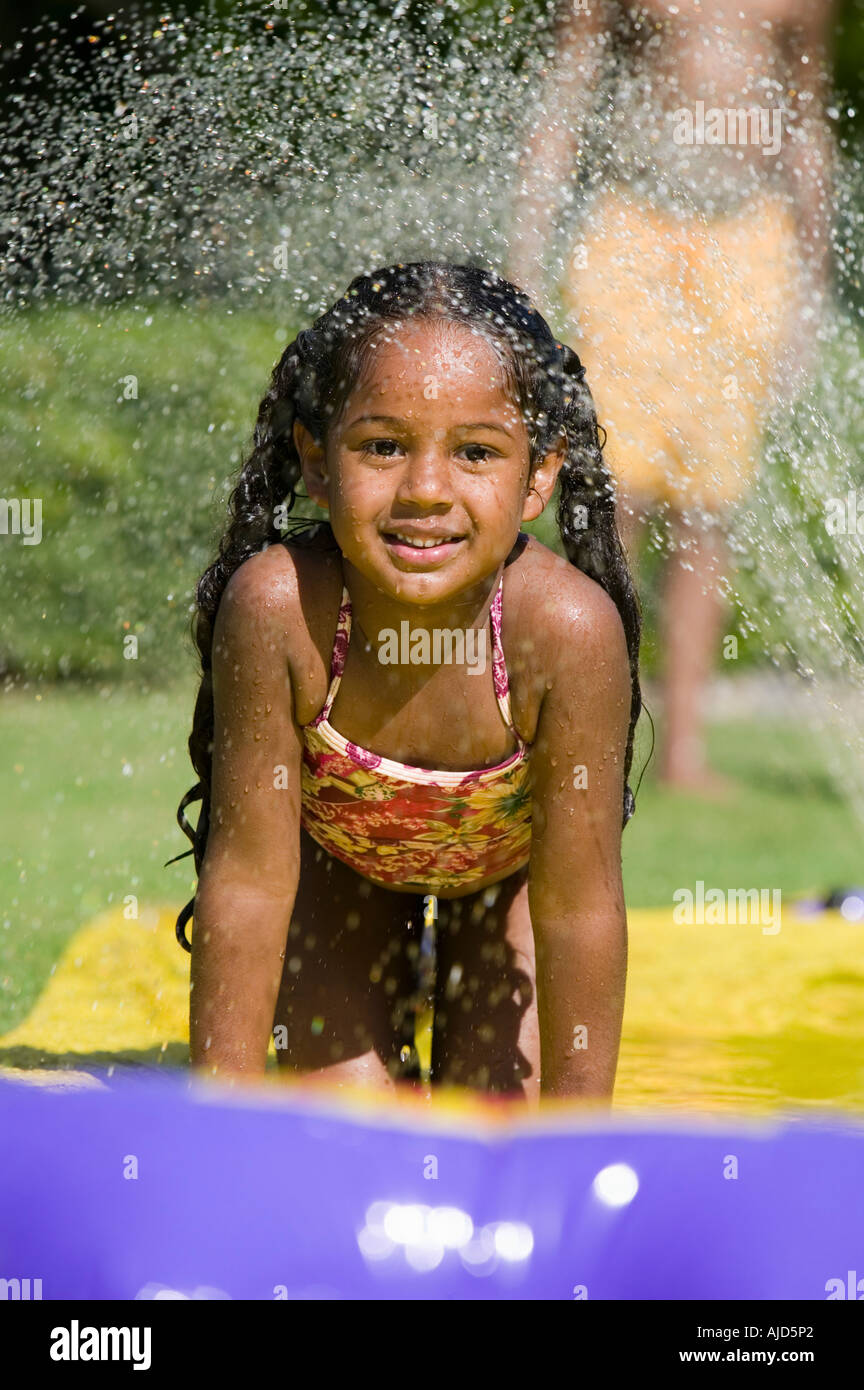 Girl water slide hi-res stock photography and images - Alamy